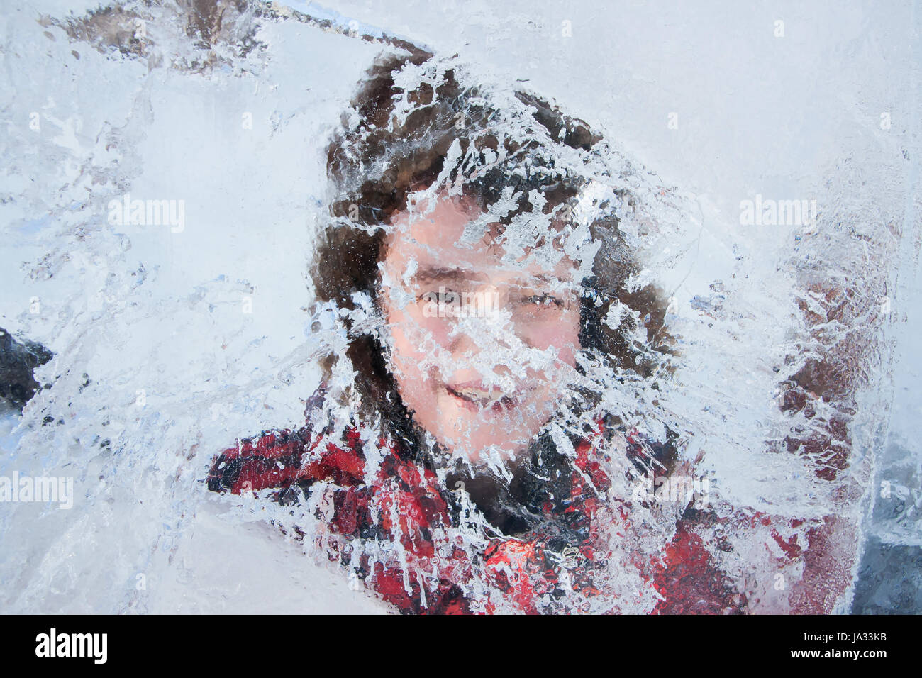 Boy looking through ice hi-res stock photography and images - Alamy