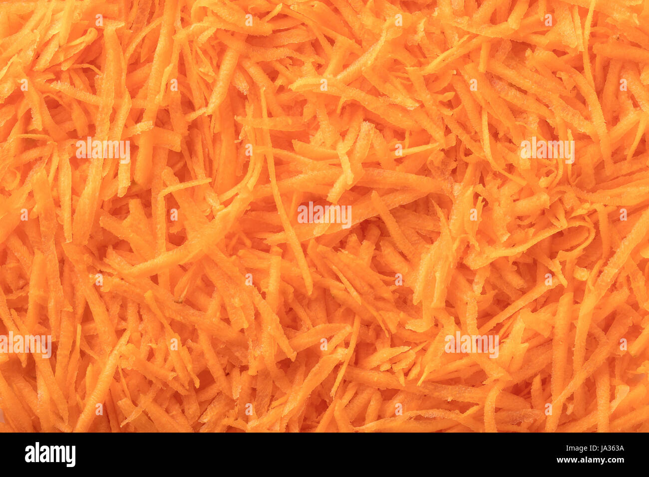 abstract background texture of raw carrots closeup Stock Photo - Alamy