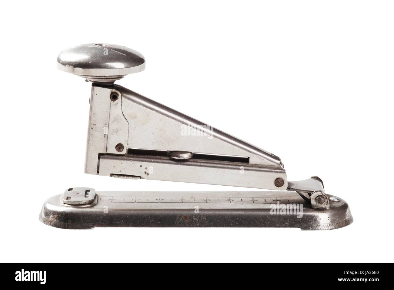 Closeup of an antique stapler isolated on white Stock Photo - Alamy