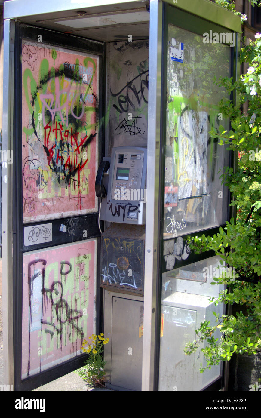 vandalized telephone box Stock Photo - Alamy