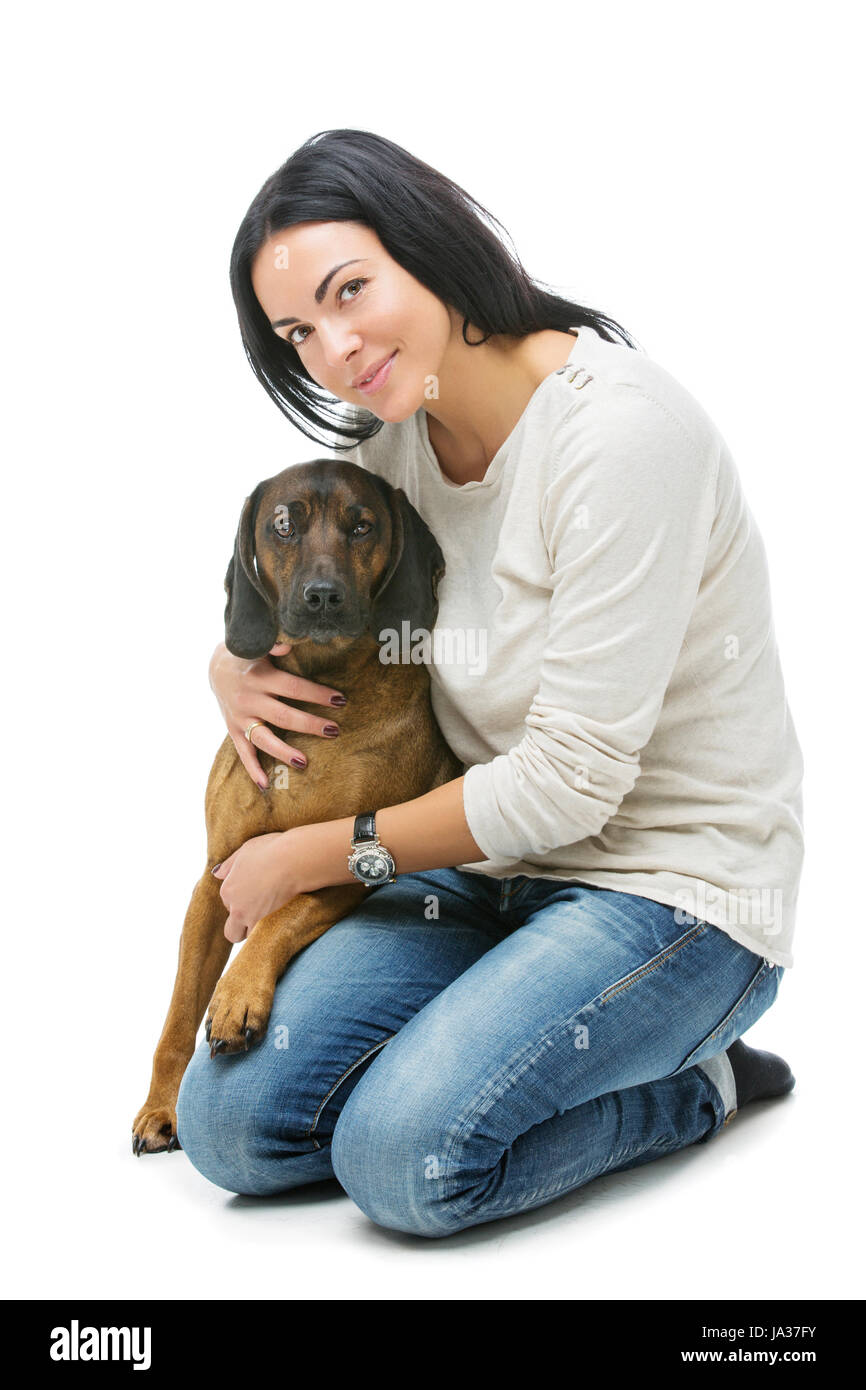 Beautiful young woman with Bavarian mountain hound dog isolated on ...