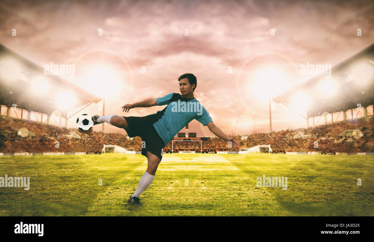 Footballer shooting goal hi-res stock photography and images - Alamy