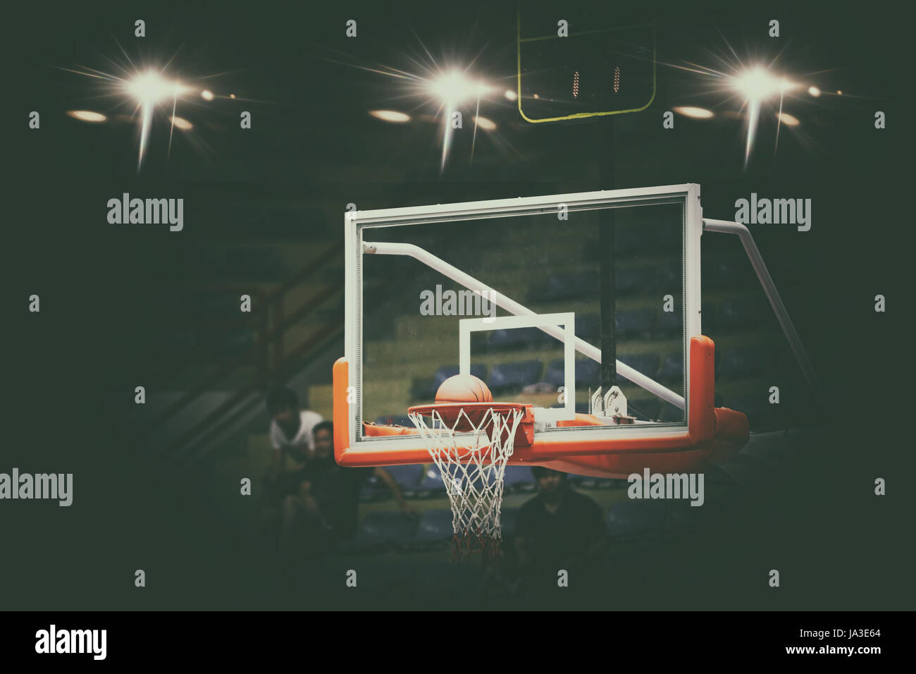 Basketball going through hoop hi-res stock photography and images - Alamy