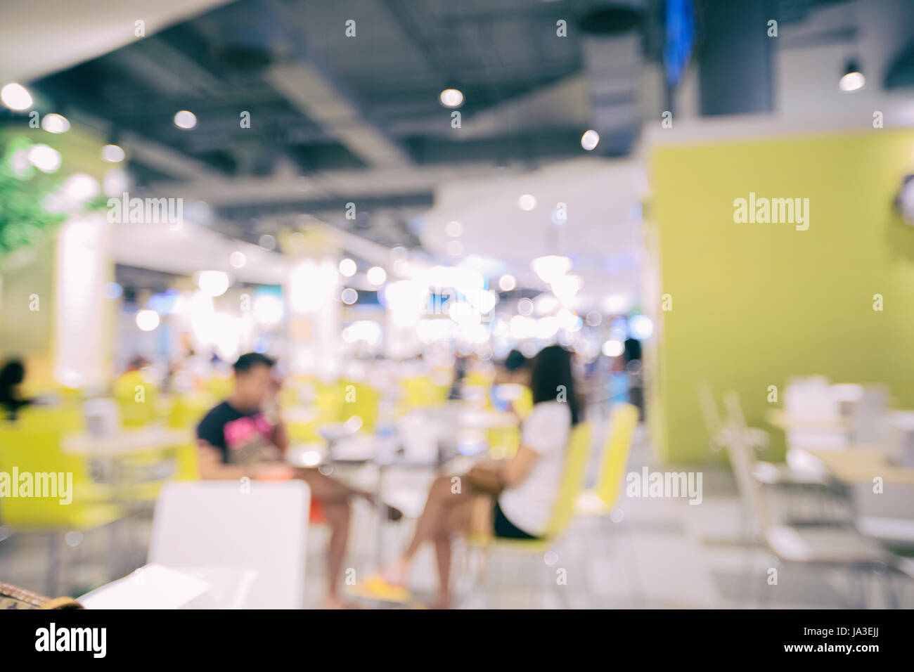 Abstract circular bokeh background of food court at supermarket/mall ...
