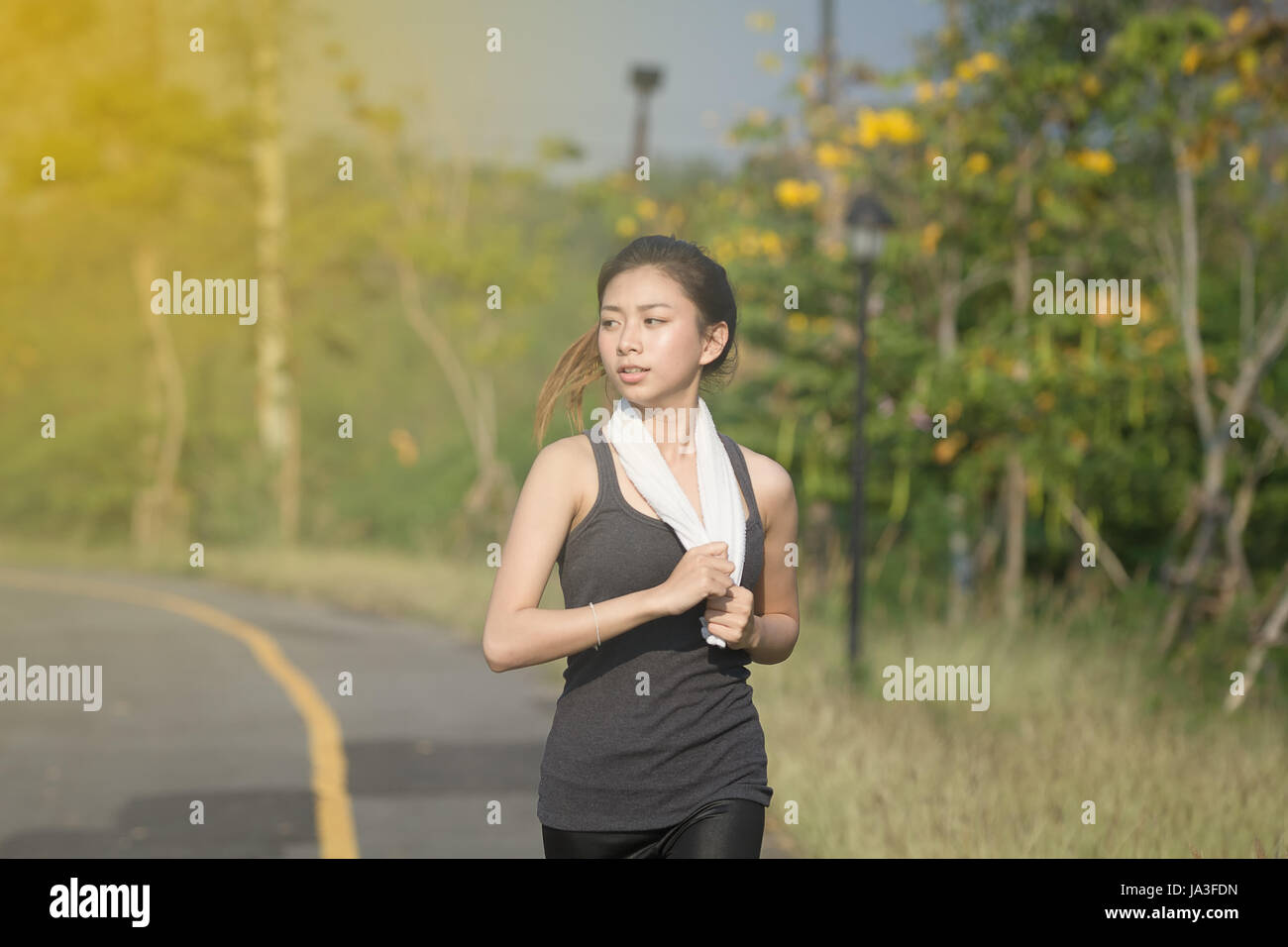 Blurry and soft focus of Running woman. Female runner jogging during ...