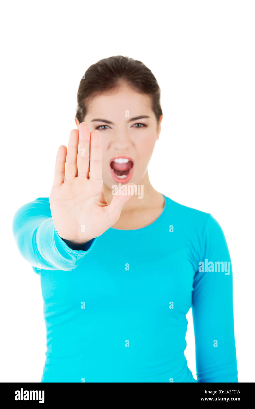 Hold on, Stop gesture showed by young woman hand Stock Photo - Alamy