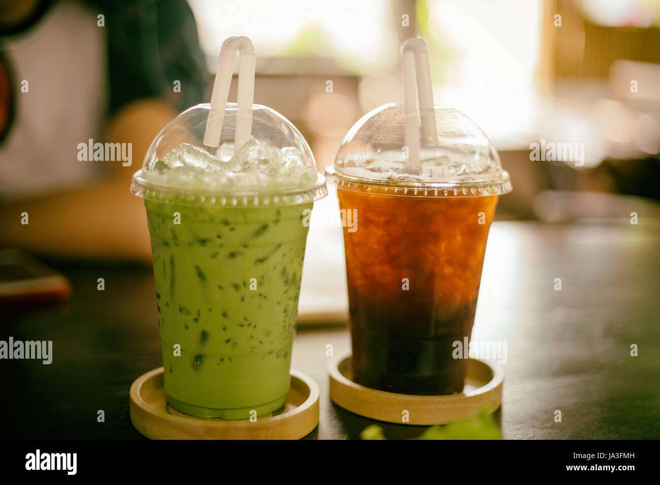 green tea and tea cool on table Stock Photo - Alamy