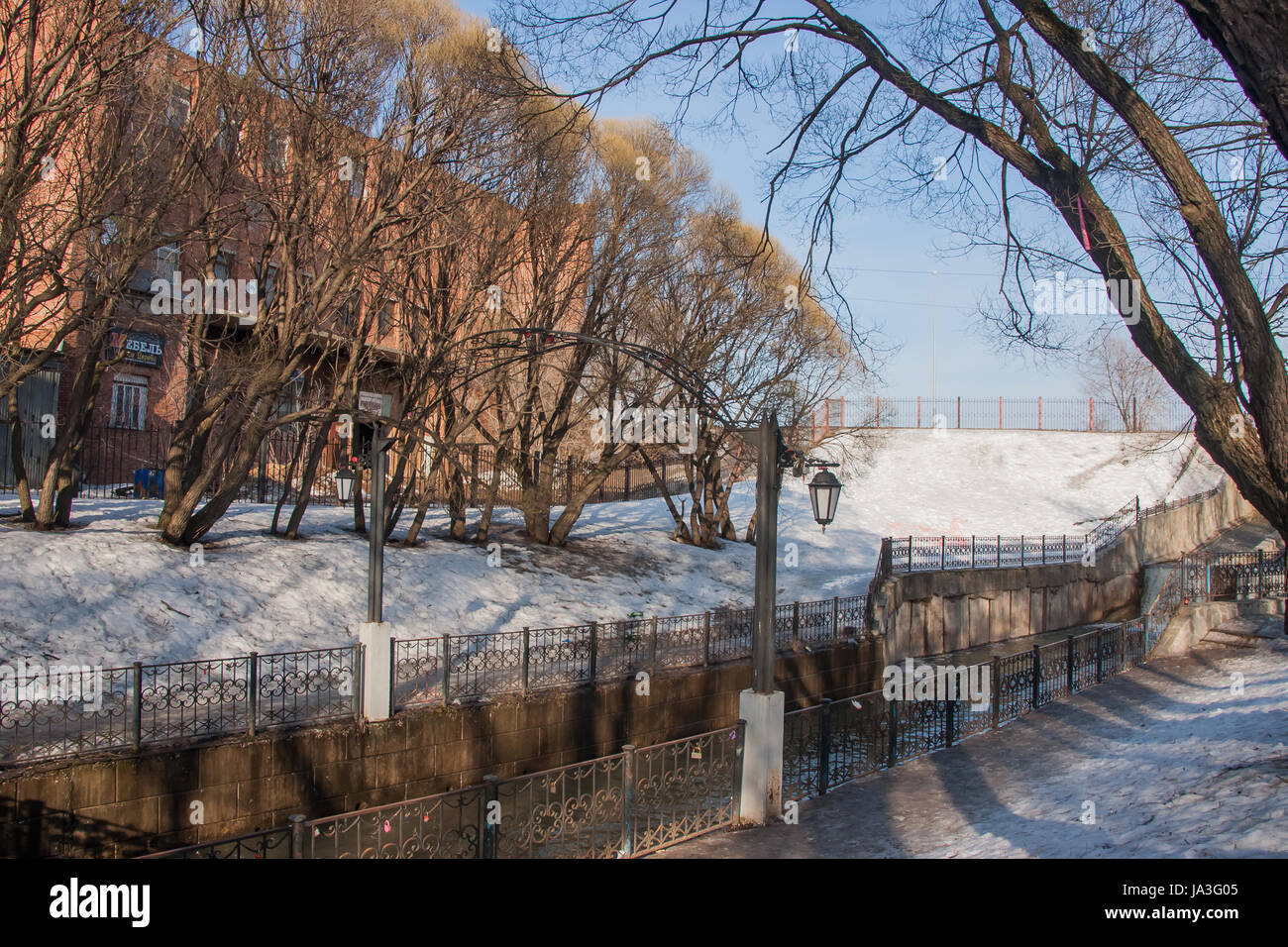 Perm, Russia - March 31,2016: Water channel in a park in spring sunny ...