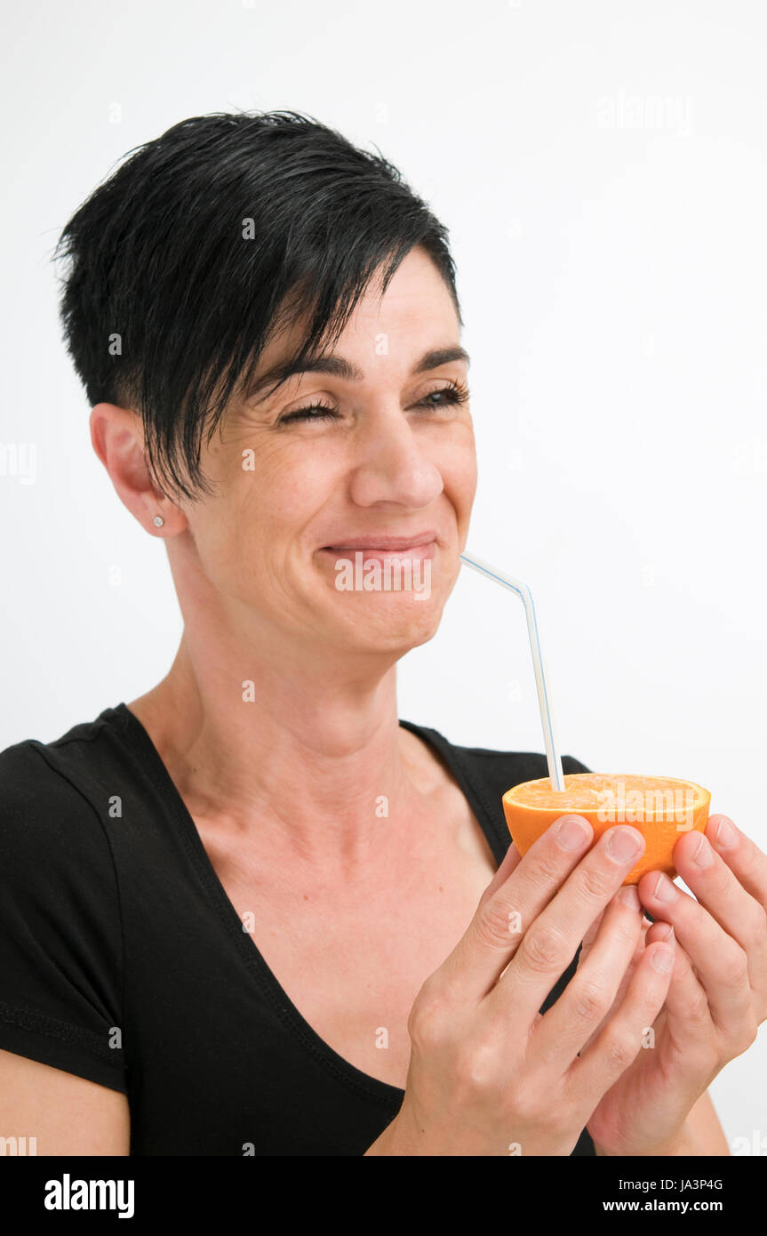 woman grin with orange Stock Photo - Alamy