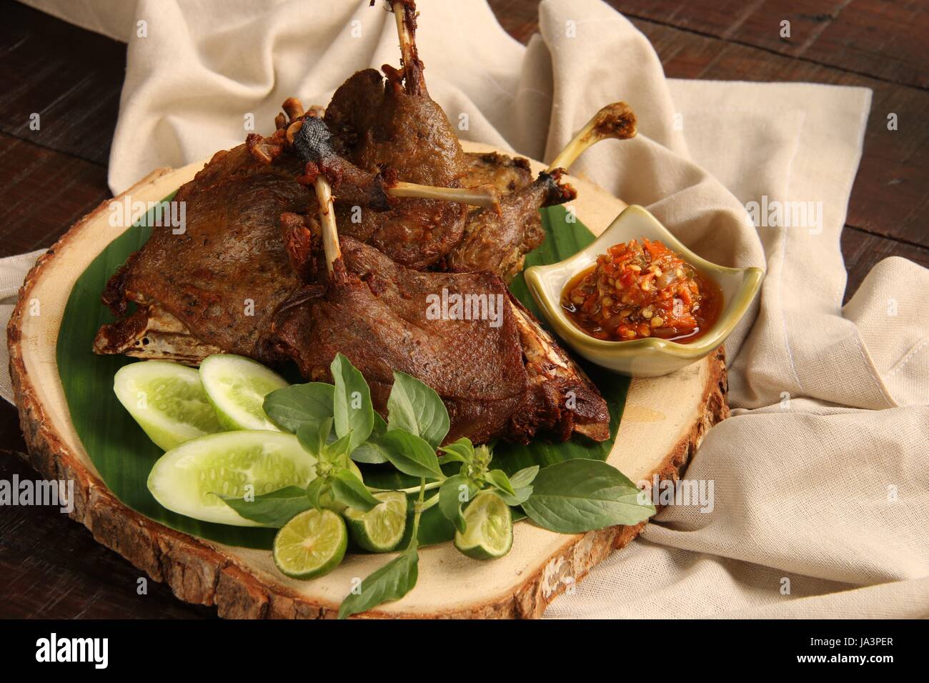 Bebek Goreng, a Popular Indonesian Dish of Fried Duck, Served with Red ...