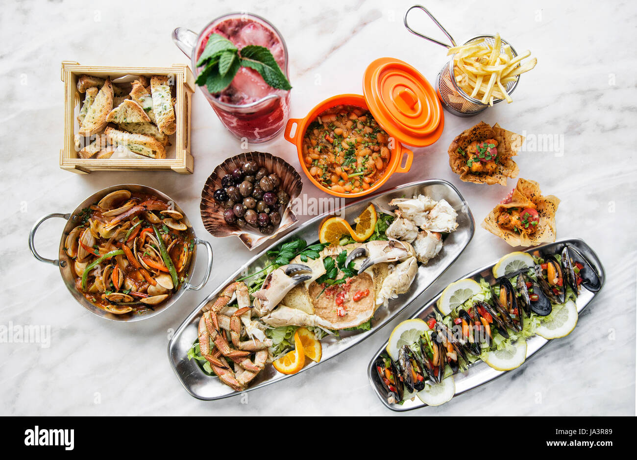 mixed fresh seafood selection gourmet set meal on table Stock Photo - Alamy