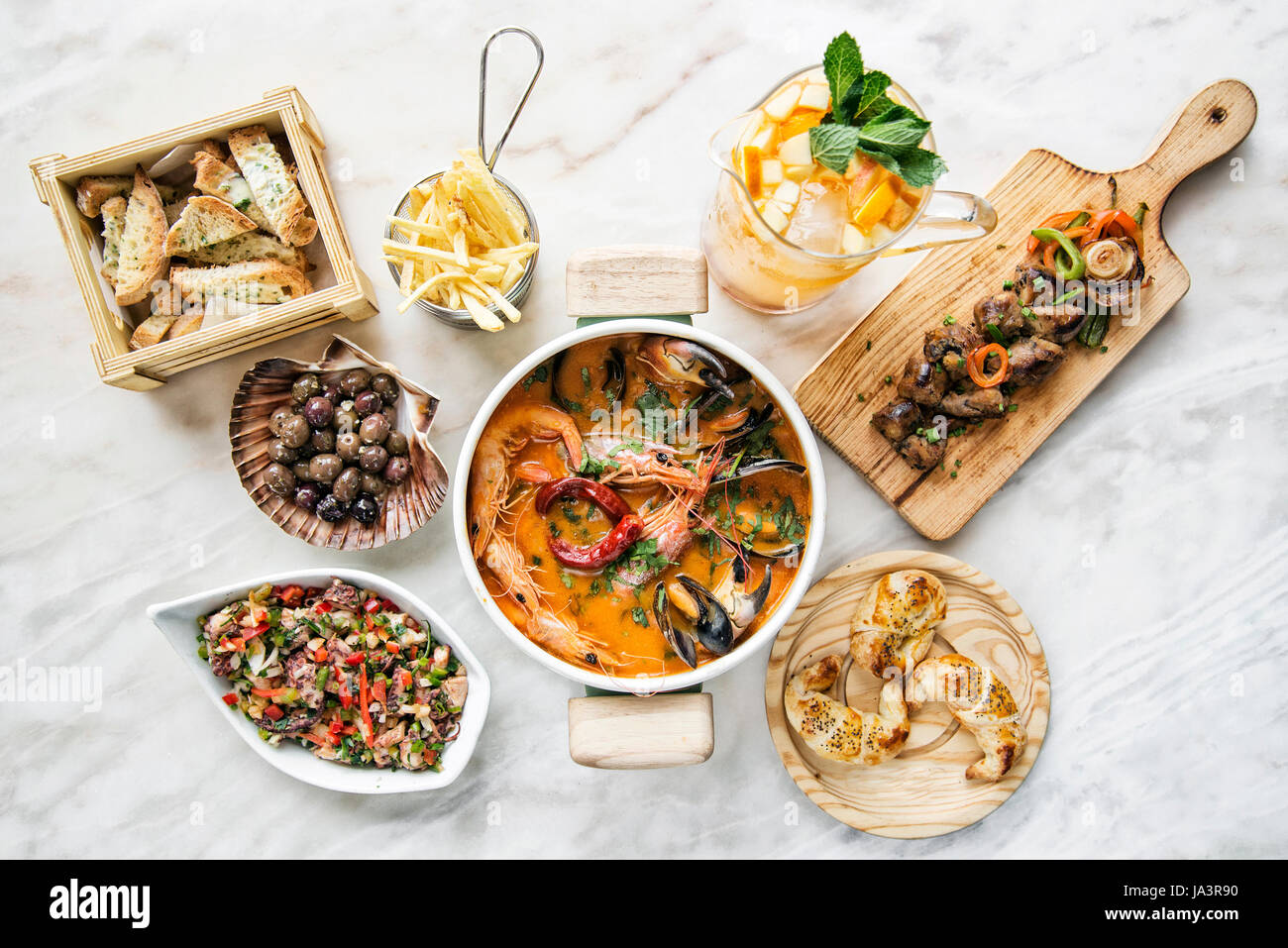mixed fresh seafood selection gourmet set meal on table Stock Photo - Alamy