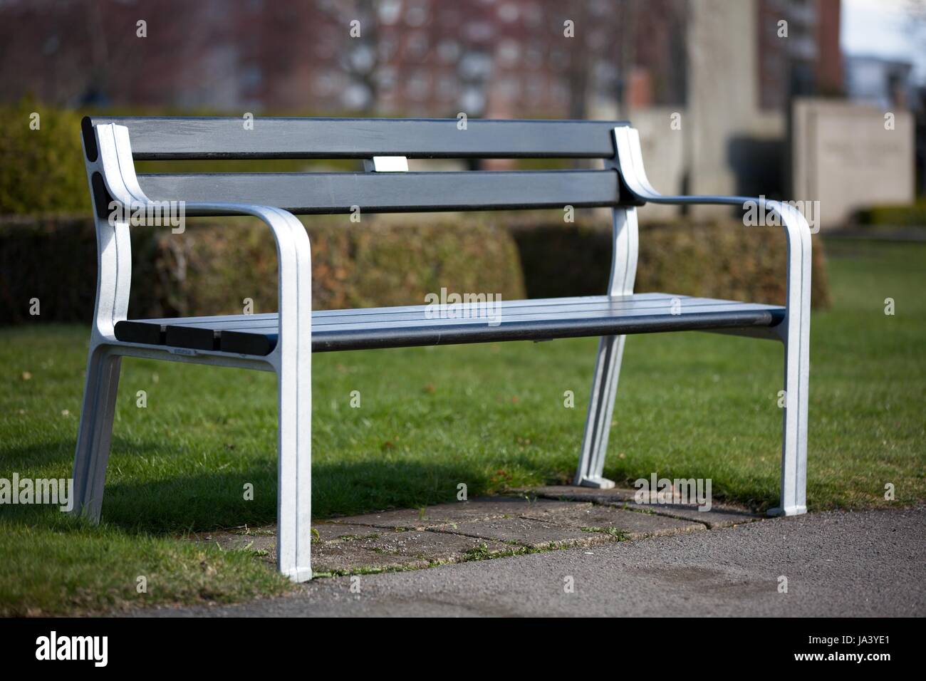 Bench in a cemetery Stock Photo - Alamy