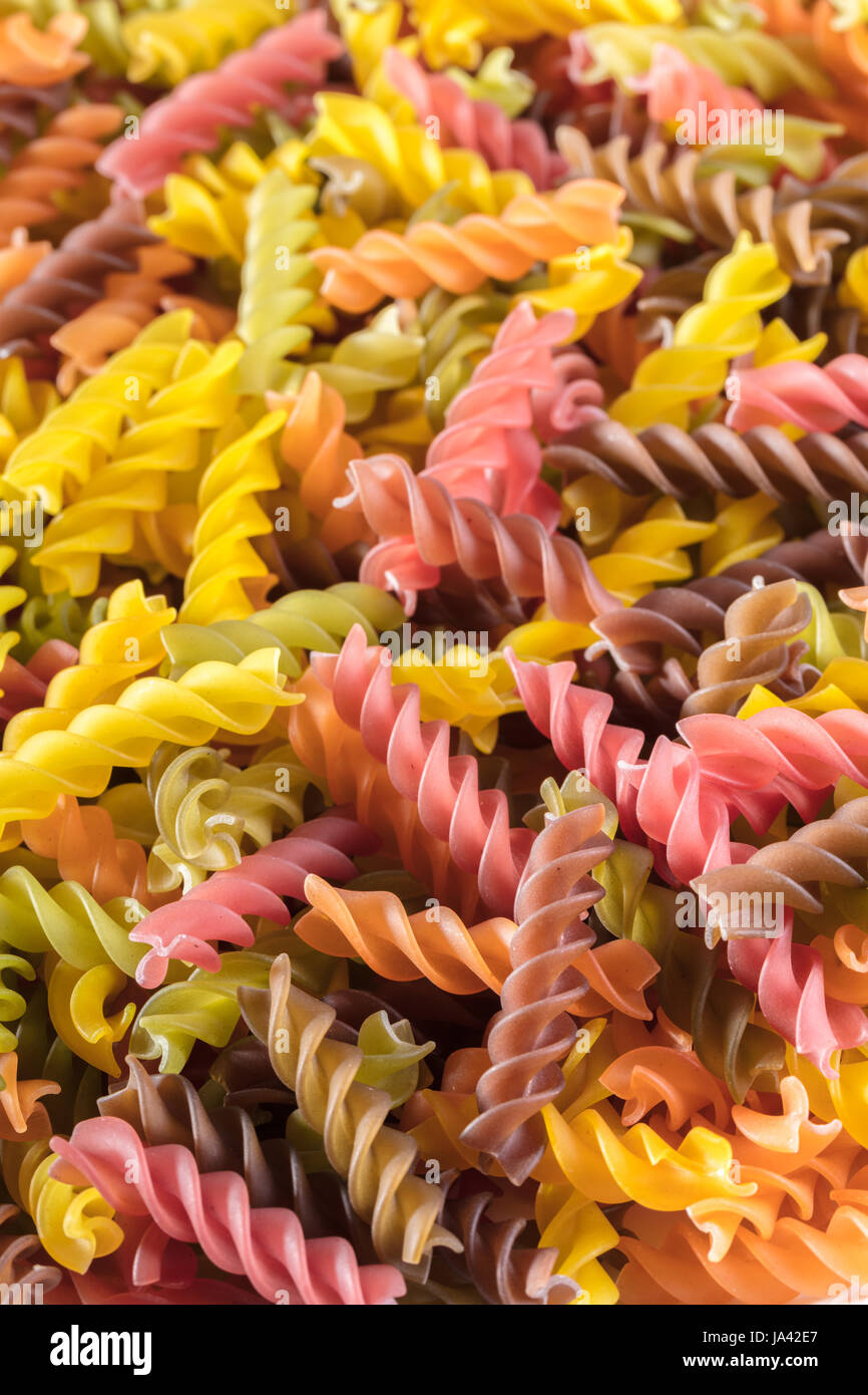 abstract background of colored pasta texture close-up Stock Photo - Alamy