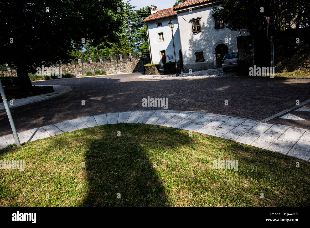 Stone crossroad on the courtyard of Gorizia's castle Stock Photo - Alamy