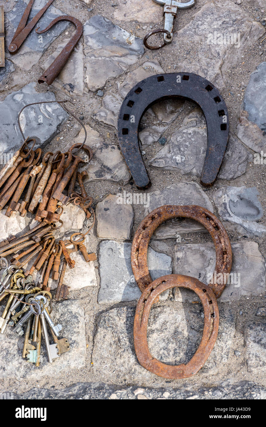 Variety of antique treasure items at Portugal market - pirates ...