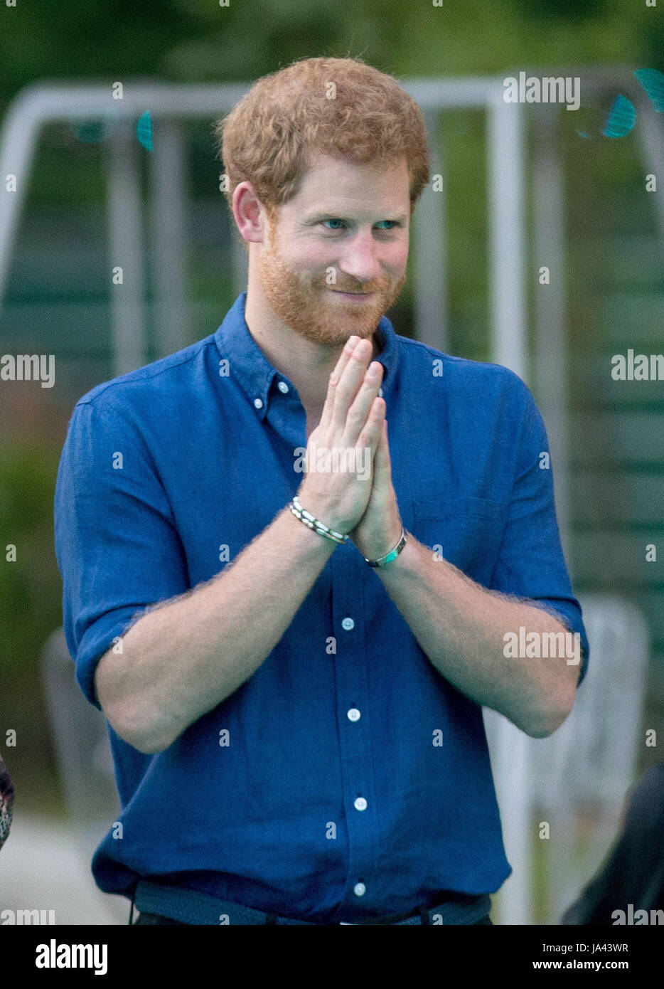 Prince Harry watches a martial arts display at the Jamiyah Education ...