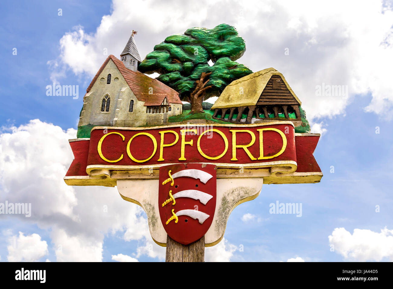 WOODEN PAINTED VILLAGE SIGN AT COPFORD, ESSEX Stock Photo - Alamy