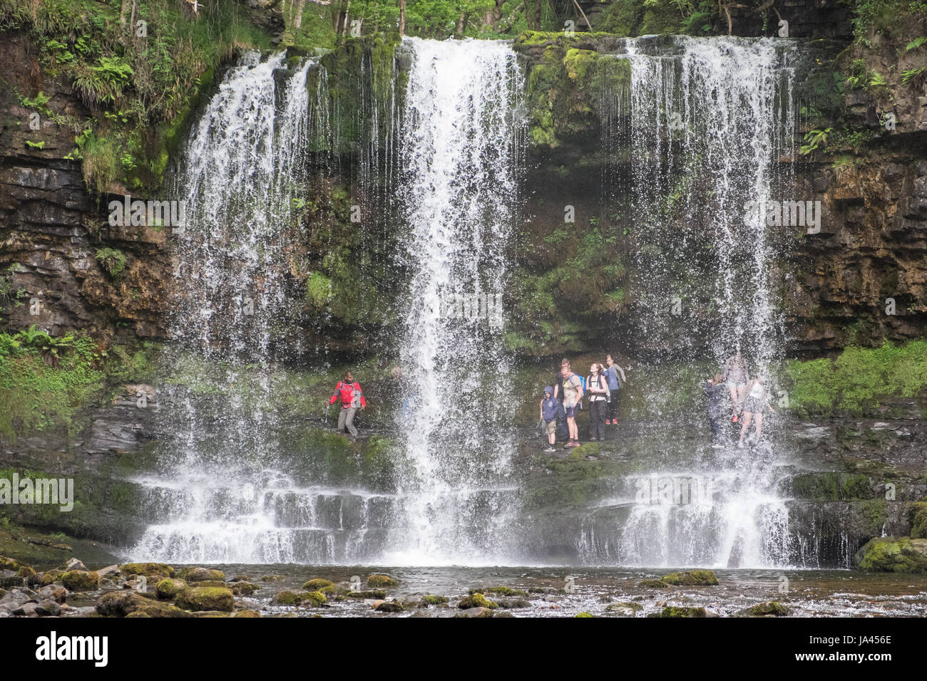 People,hiking,walk,behind,beneath,waterfall,Sgwd yr Eira,Waterfall of ...