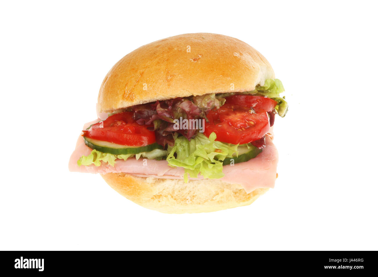Ham and salad in a crusty roll isolated against white Stock Photo - Alamy