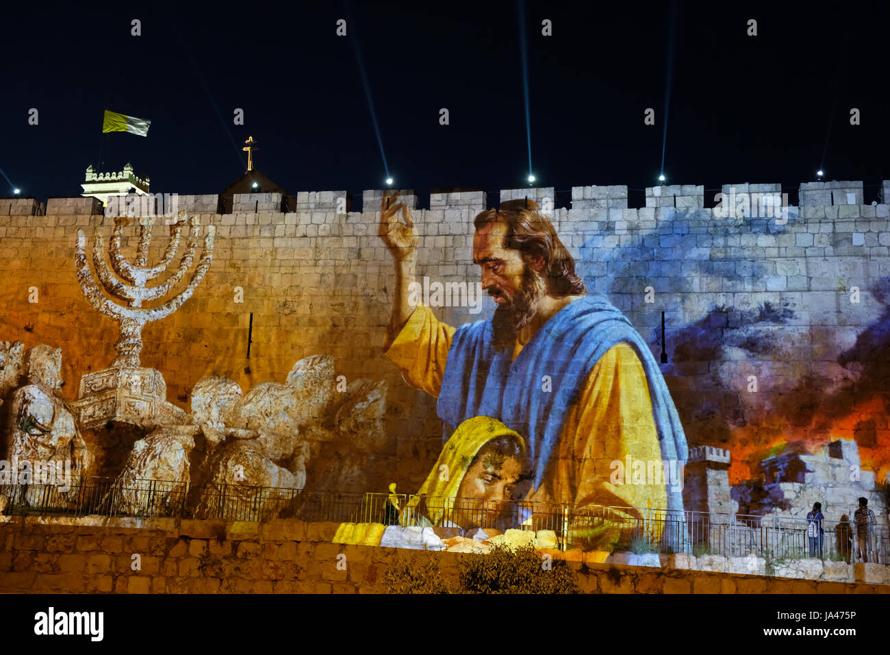 Biblical scenes are projected on the walls of the Old City of Jerusalem ...