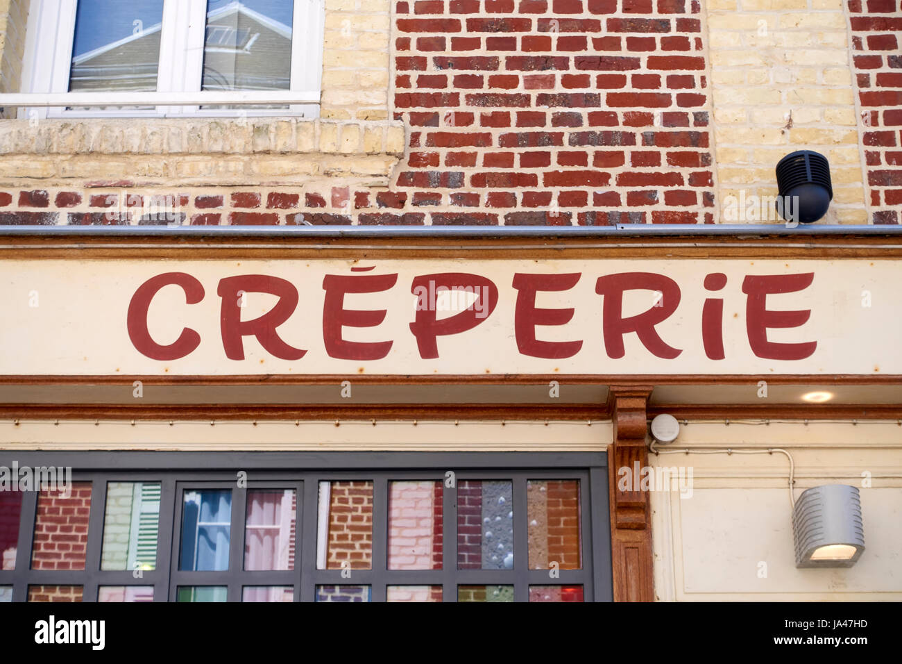 Creperie sign on a restaurant wall in France Stock Photo - Alamy