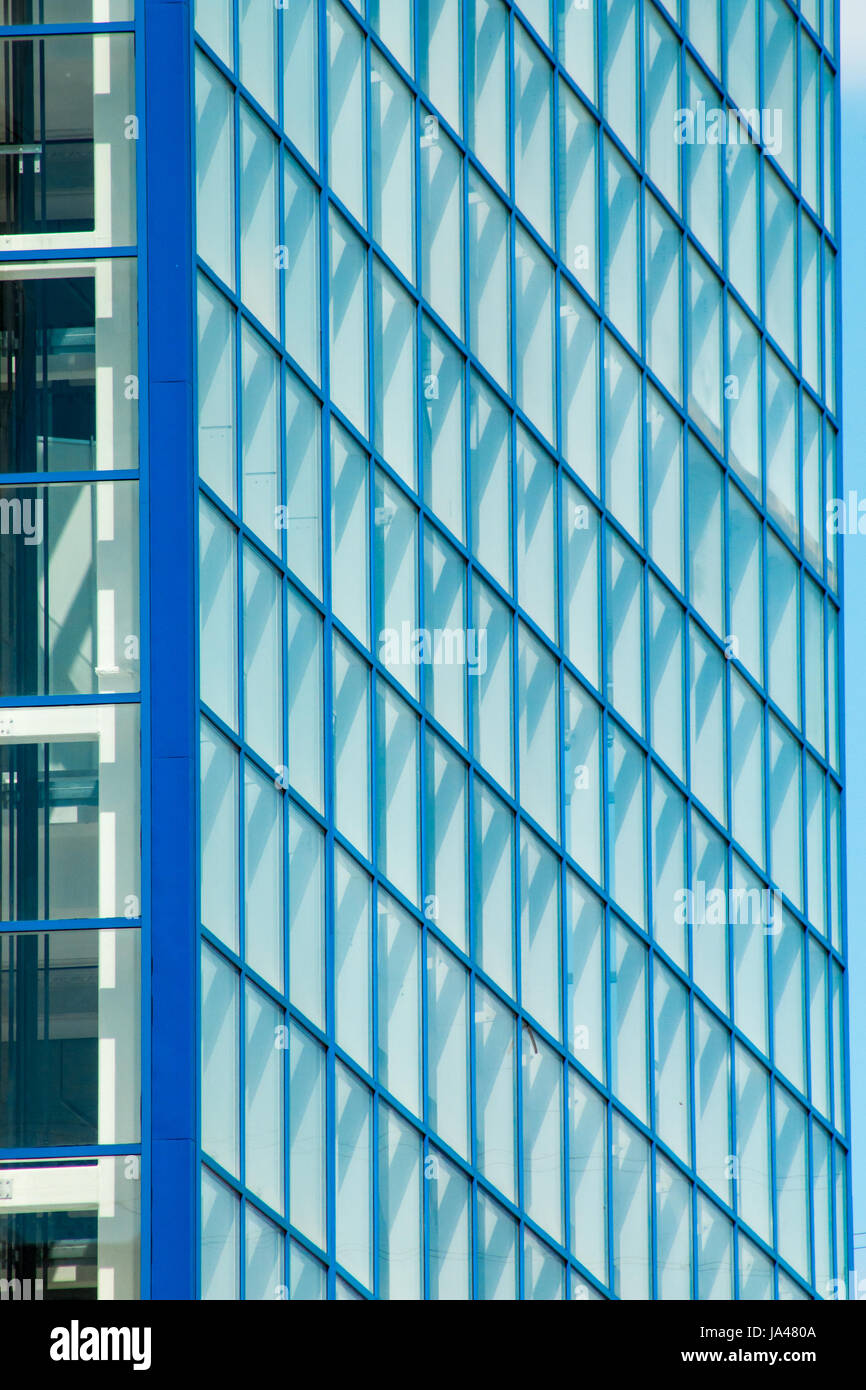 The facade of a modern glass and metal building Stock Photo - Alamy