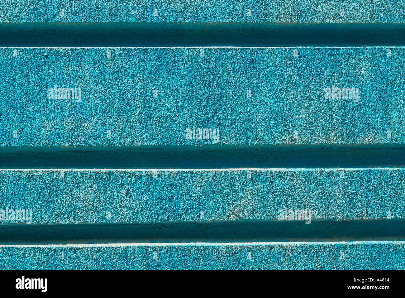 Blue plaster on the facade of a modern building background texture ...