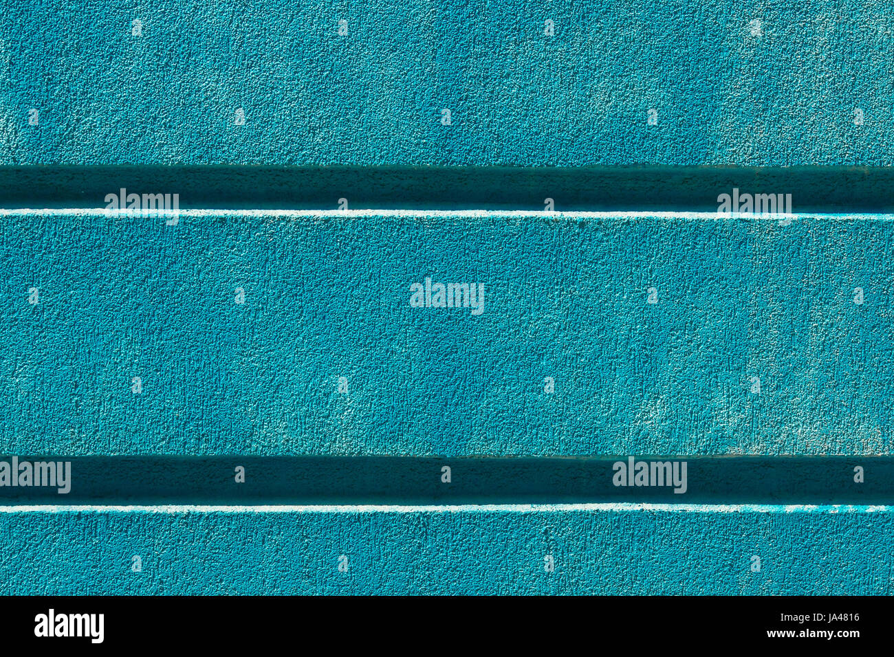 Blue plaster on the facade of a modern building background texture ...