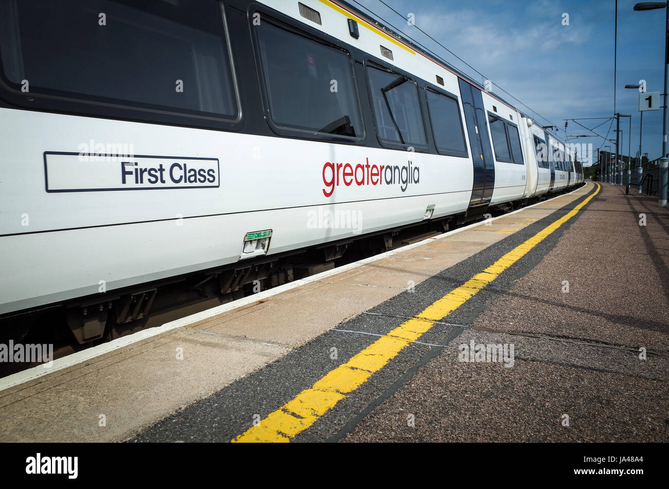 A Greater Anglia Stansted Express train arrives at Whittlesford Station ...