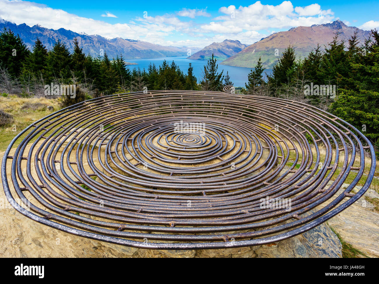 Metallic concentric circle sculpture. Basket of dreams. View point ...