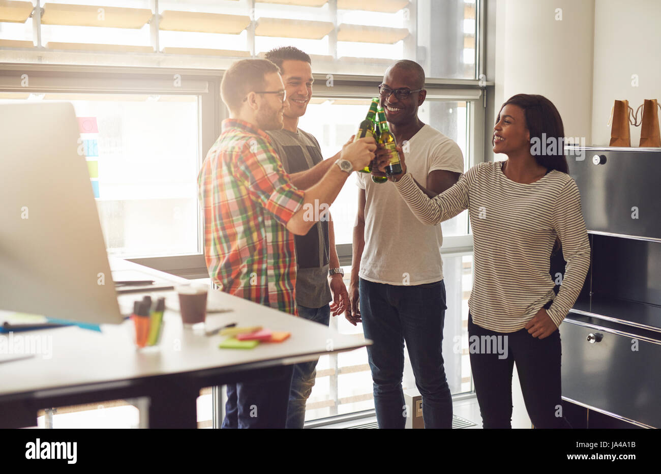 Office workers drinking alcohol hi-res stock photography and images - Alamy