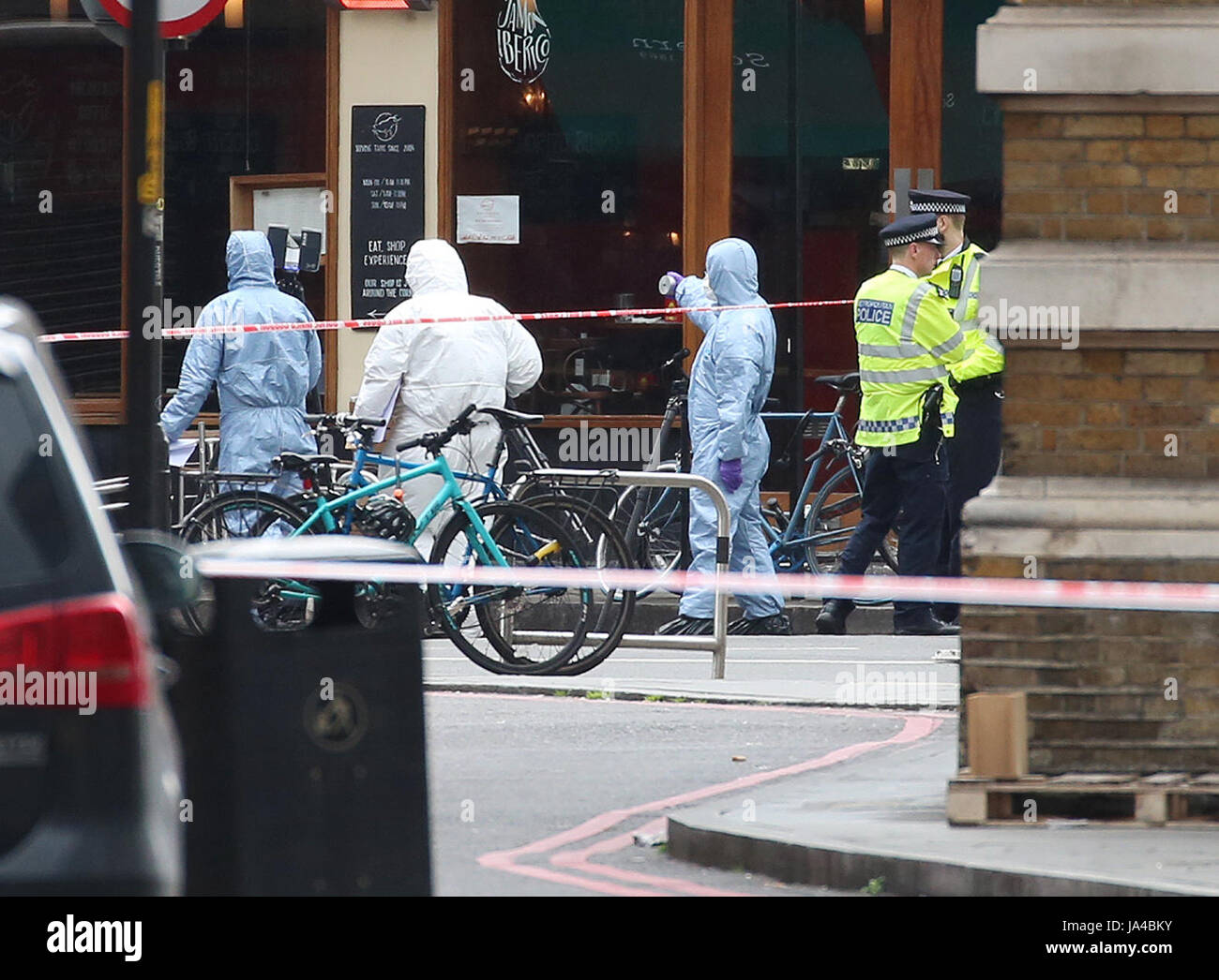 Police forensic officers at Borough Market in London following Saturday ...