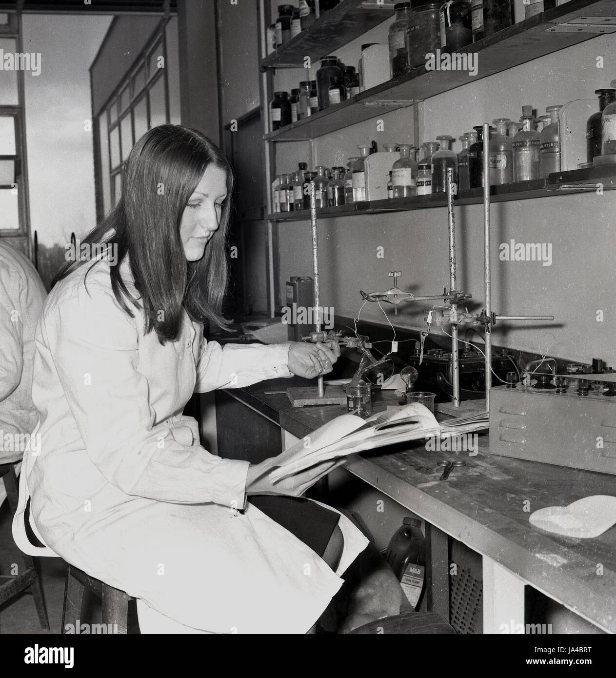 1960s, historical, female student in a scence laboratory at Sedgehill ...