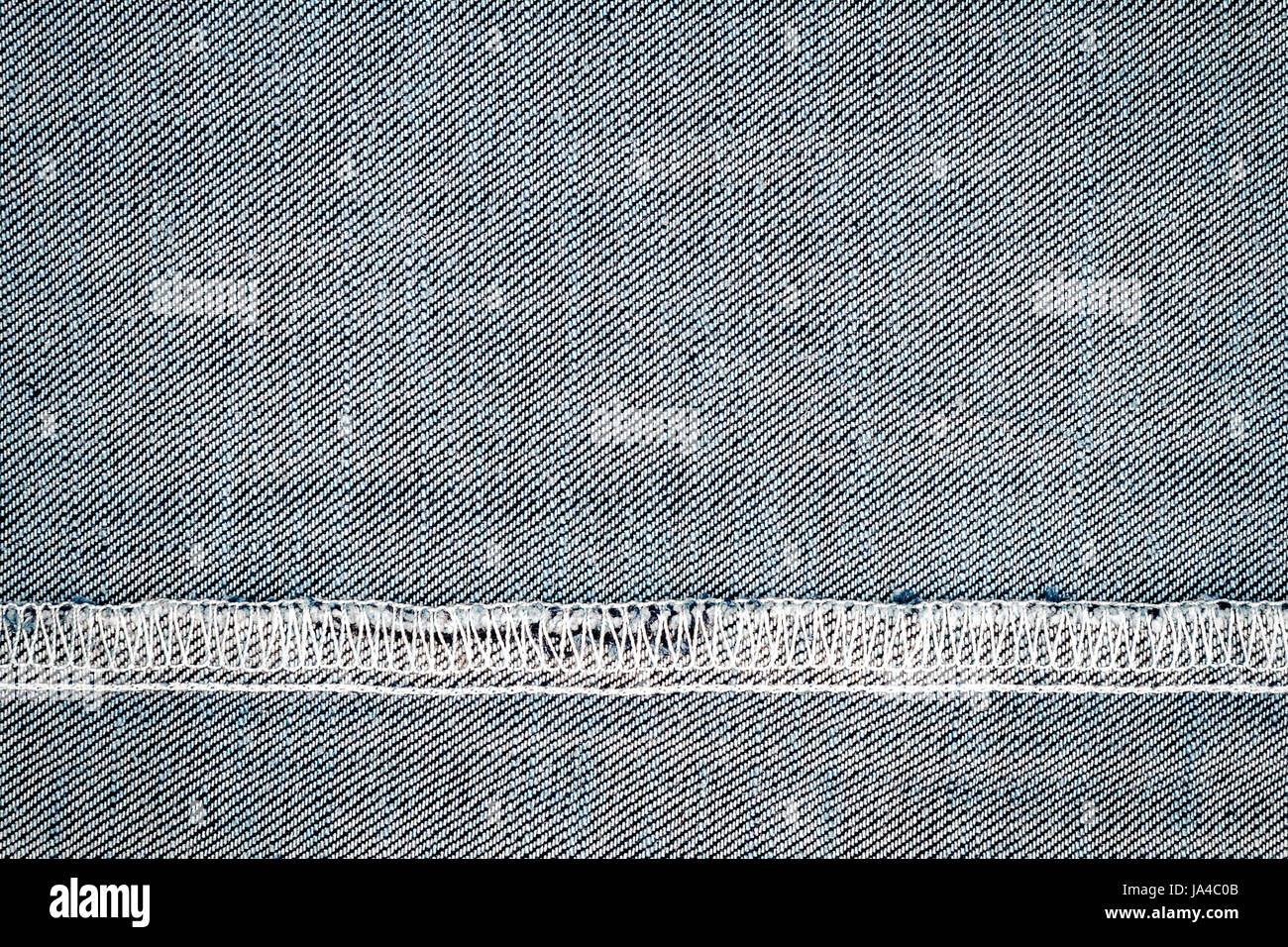 Wrong side of jeans fabric with back seam Stock Photo - Alamy