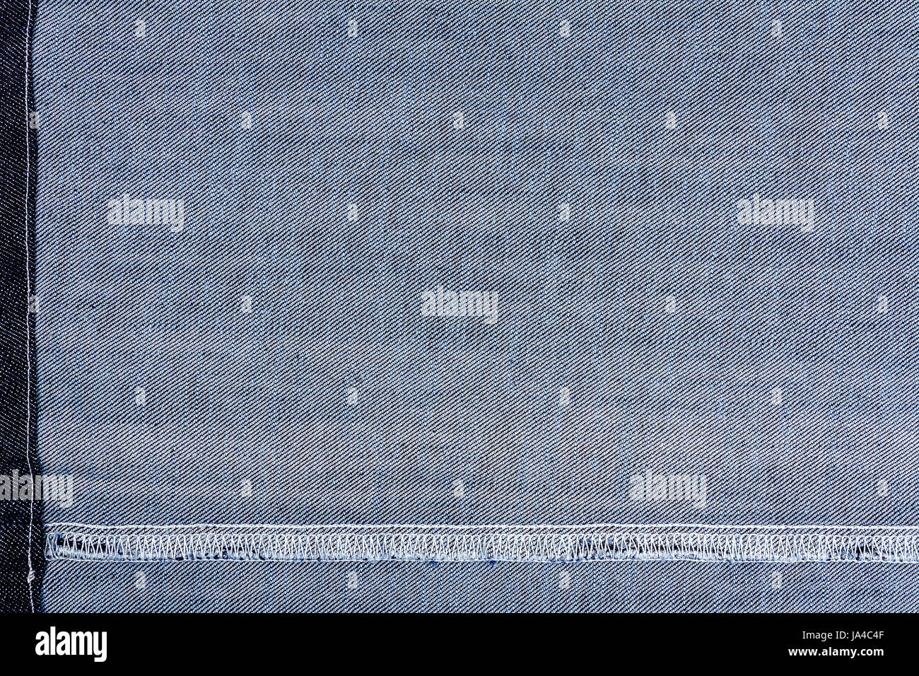 Wrong side of jeans fabric with back seam Stock Photo - Alamy