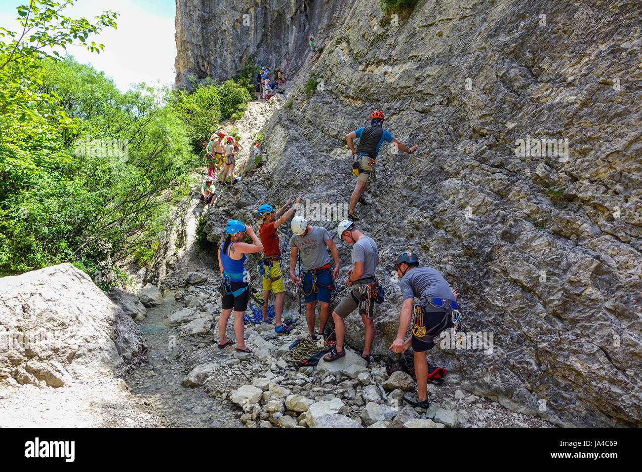 Rock climbers queueing to climb at Orpierre, France Stock Photo - Alamy