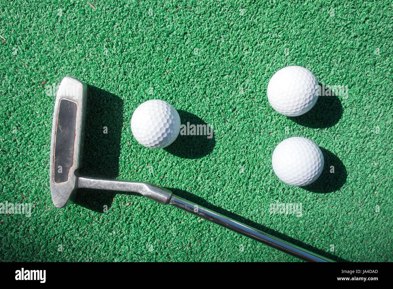 Mini golf scene with ball and club. Can be used like background. Sunny ...