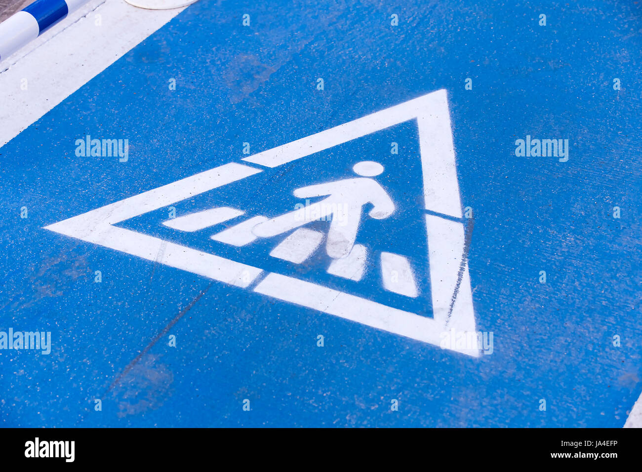 Marking on the bike lane and traffic signs Stock Photo - Alamy