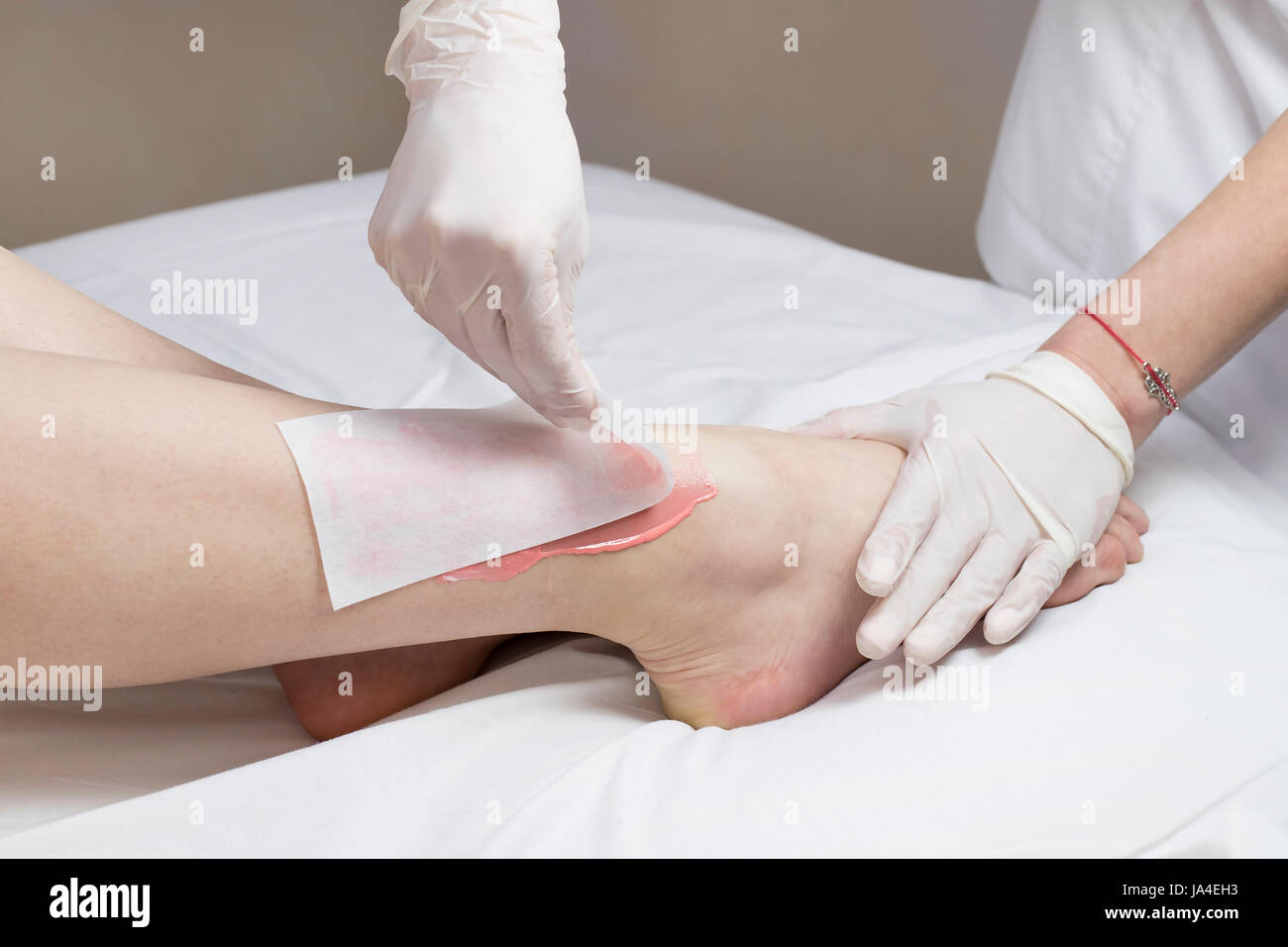Process depilation female legs and hands in a beauty salon Stock Photo ...