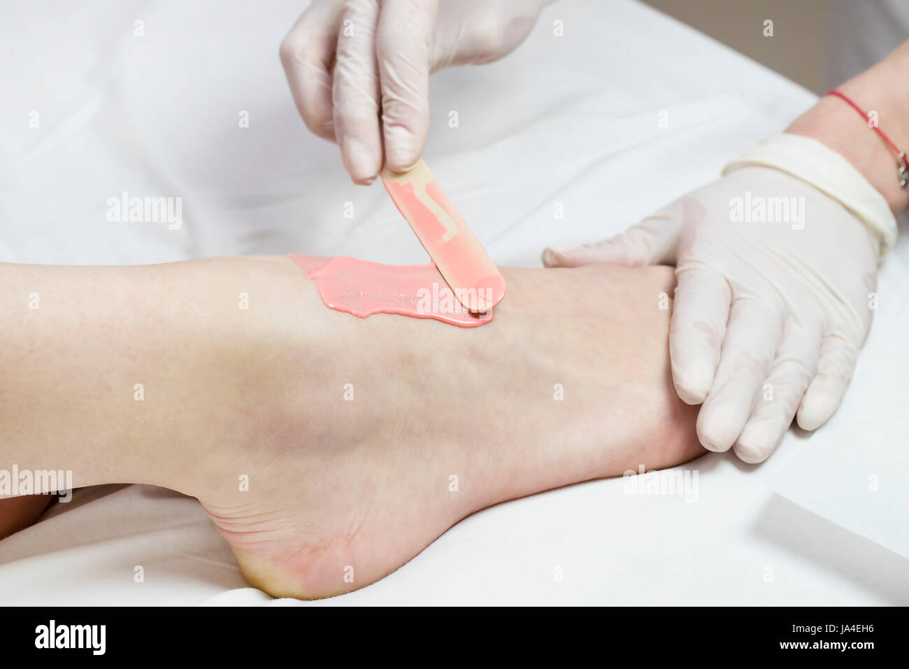 Process depilation female legs and hands in a beauty salon Stock Photo ...