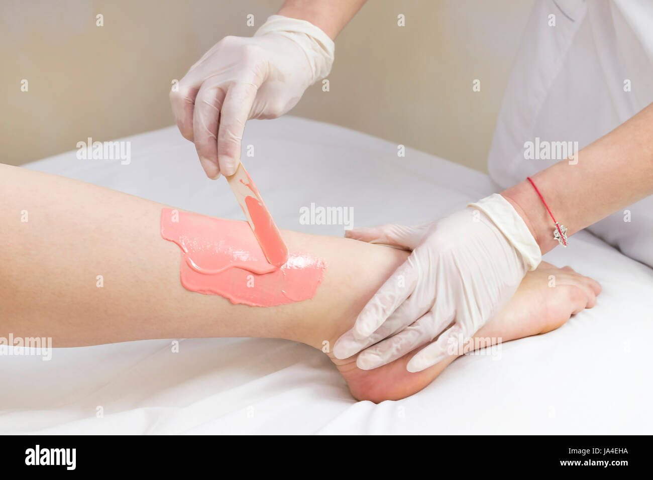Process depilation female legs and hands in a beauty salon Stock Photo ...