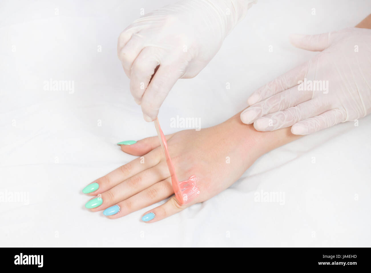Process depilation female legs and hands in a beauty salon Stock Photo ...