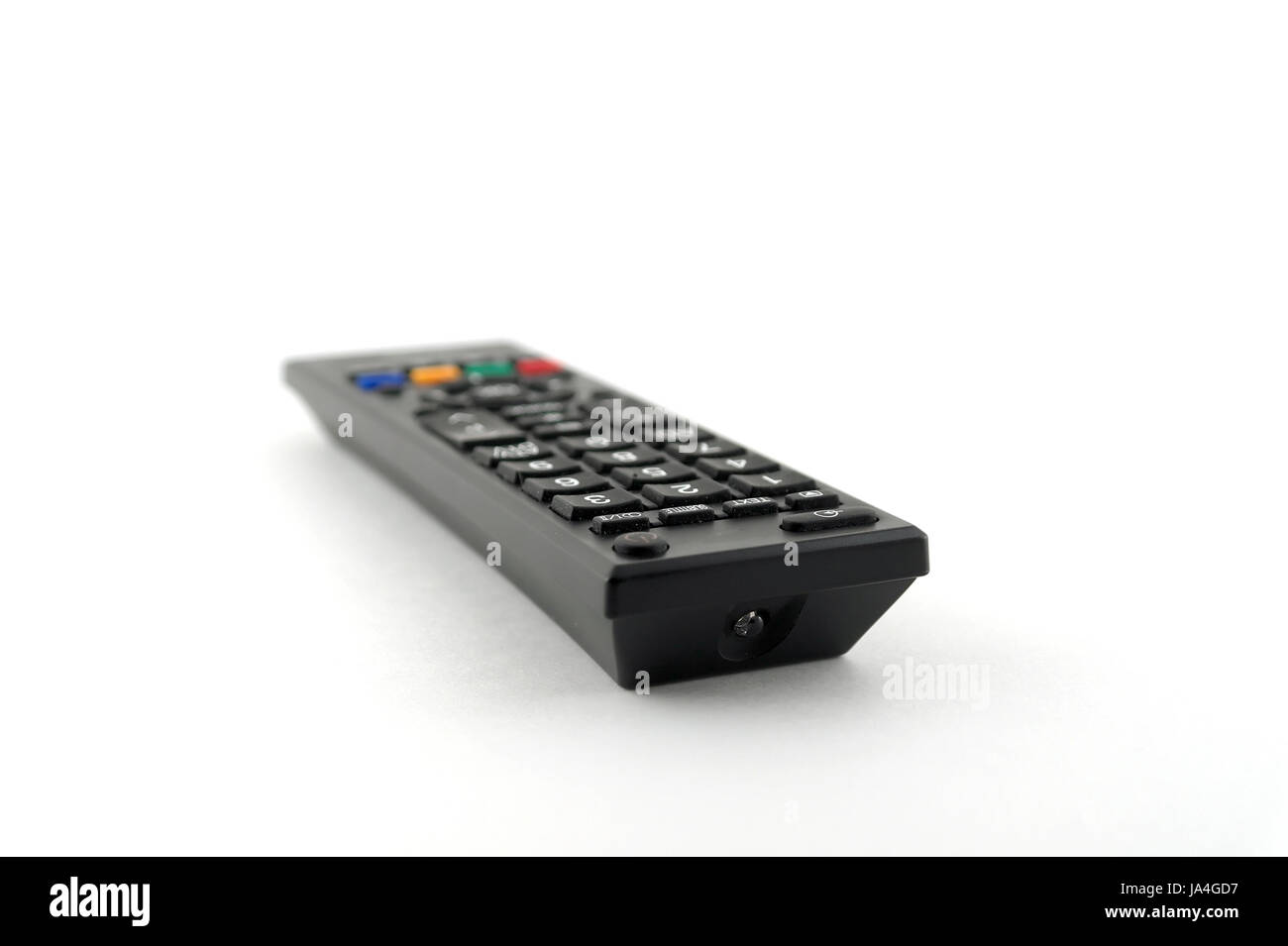 Old remote console for TV over white Stock Photo - Alamy