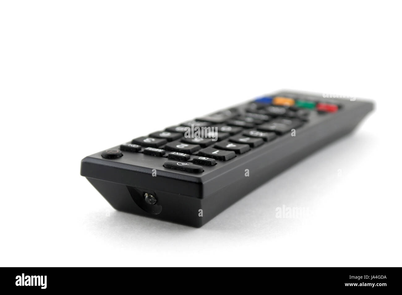 Old remote console for TV over white Stock Photo - Alamy