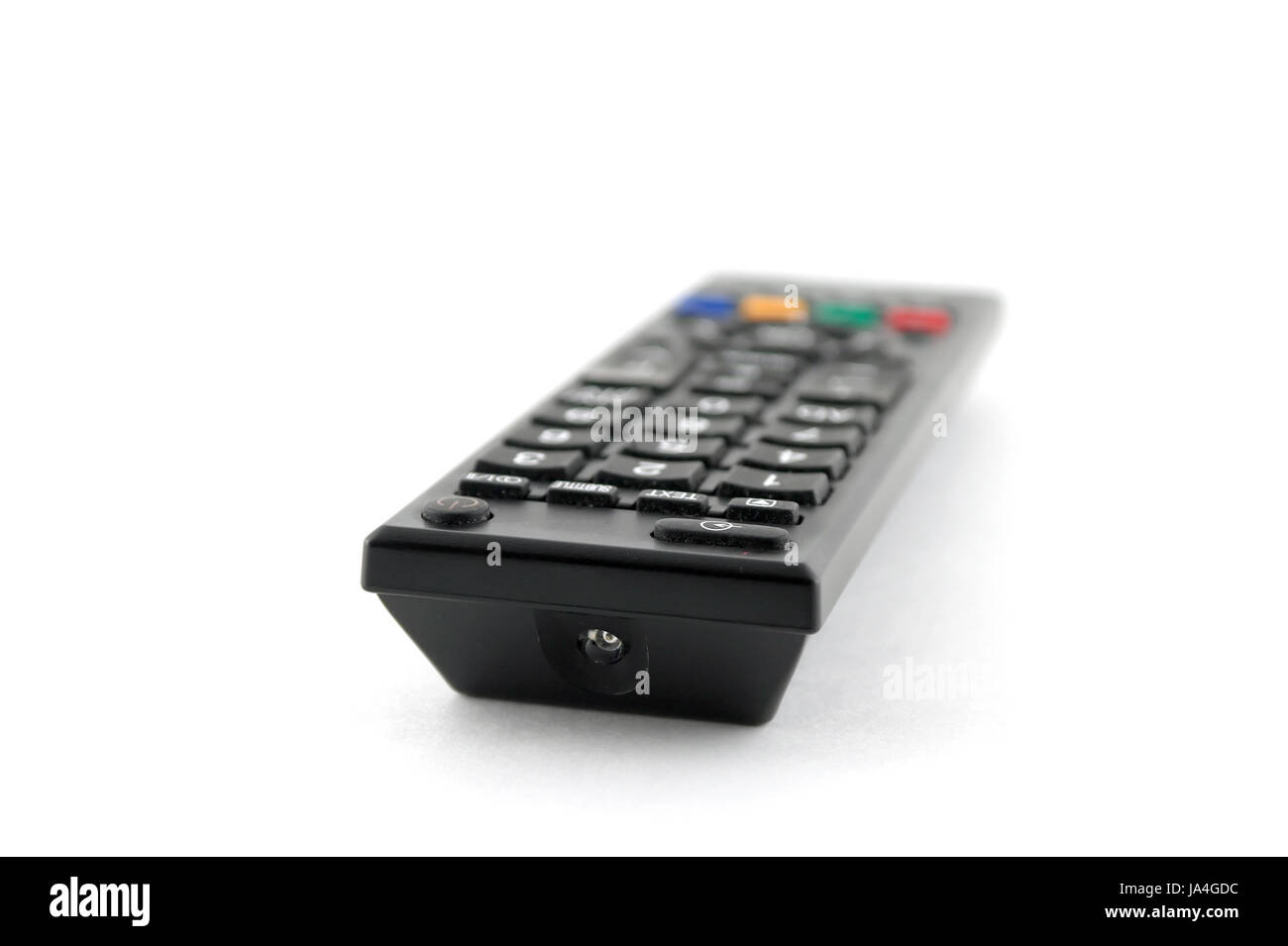 Old remote console for TV over white Stock Photo - Alamy