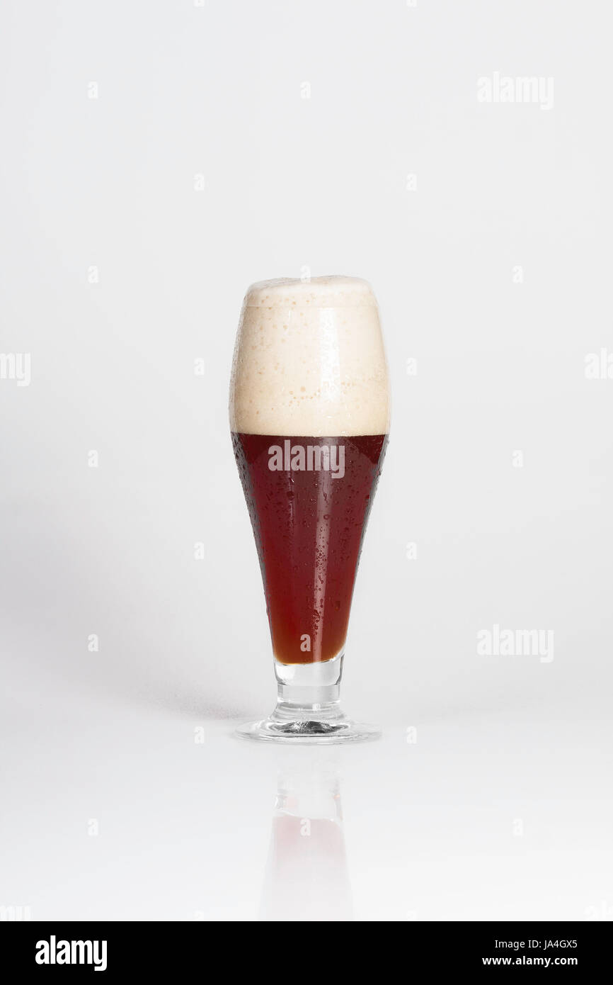 Glass of cold dark beer on a white background isolated Stock Photo - Alamy