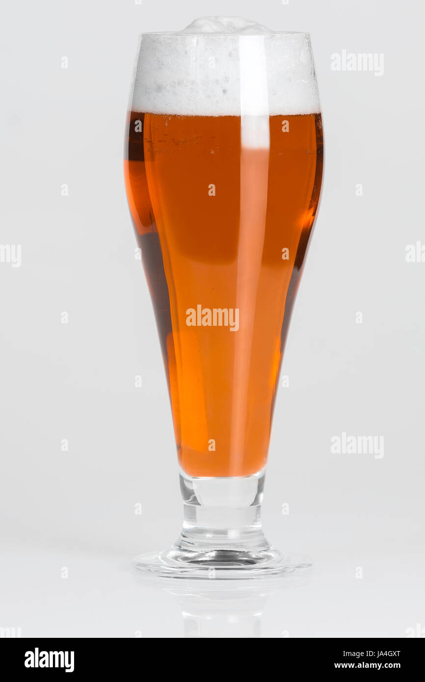 Glass of cold ruby beer on a white background isolated Stock Photo - Alamy