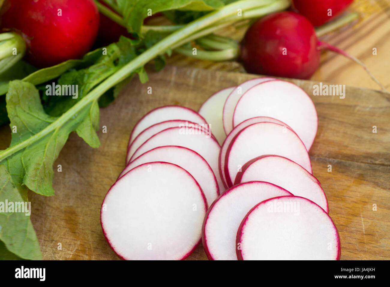 Garden red radish on wooden table hi-res stock photography and images ...