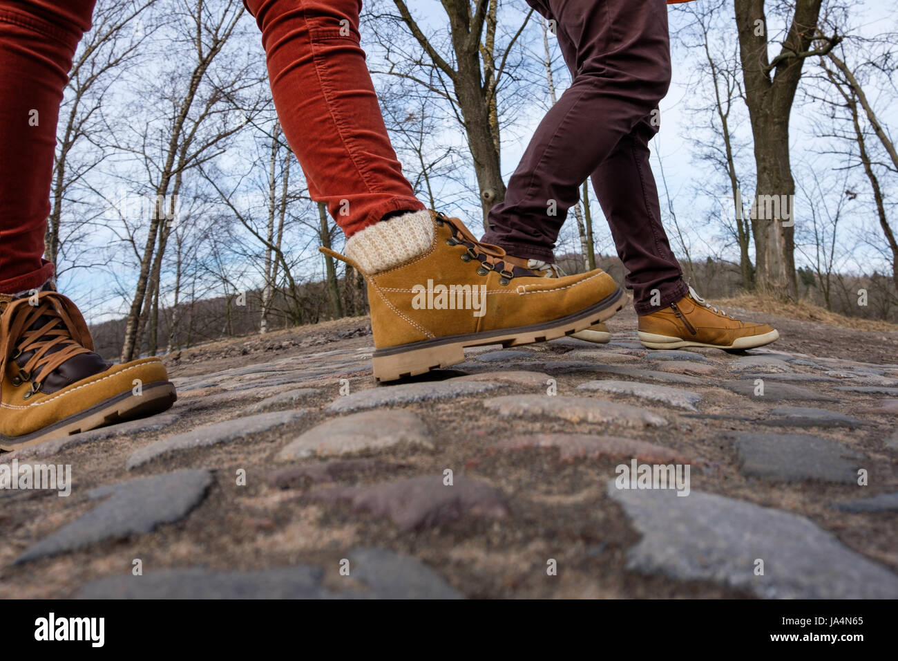 Two walk in shoes along the pavement. Walk in the fresh air Stock Photo ...